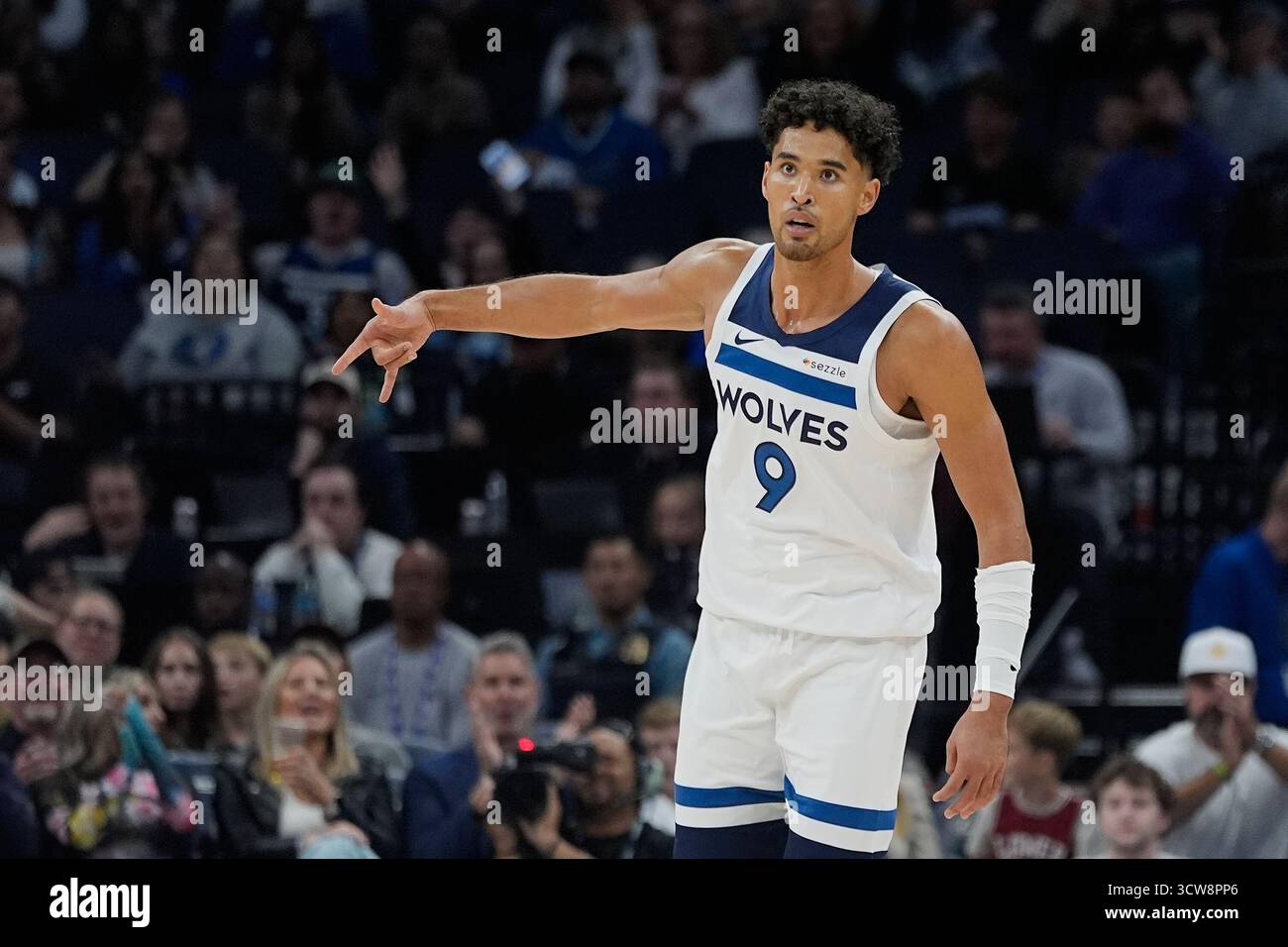 Minnesota Timberwolves guard Johnny Juzang (9) gestures after making a ...