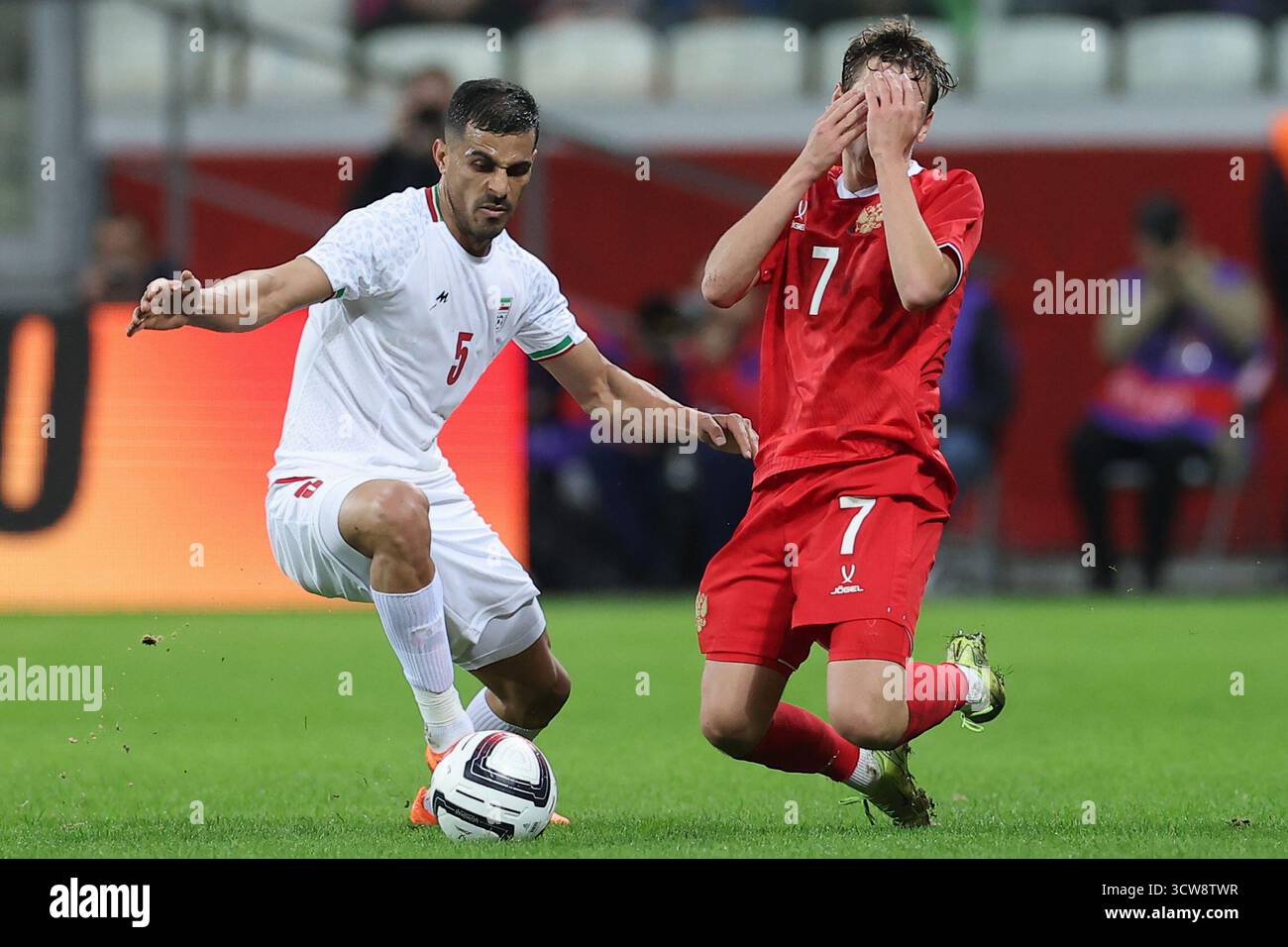 Iran's Ali Nemati, left, and Russia's Aleksei Batrakov fight for the ...