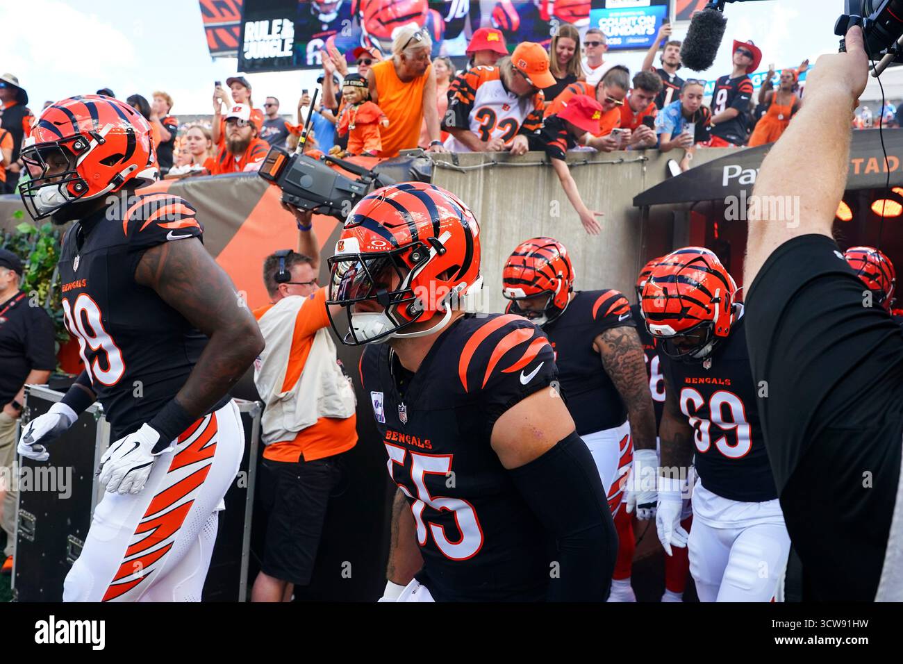 Cincinnati Bengals players take the field during an NFL football game ...