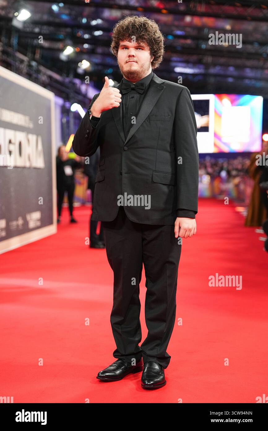 Aidan Delbis poses for photographers upon arrival at the premiere of ...