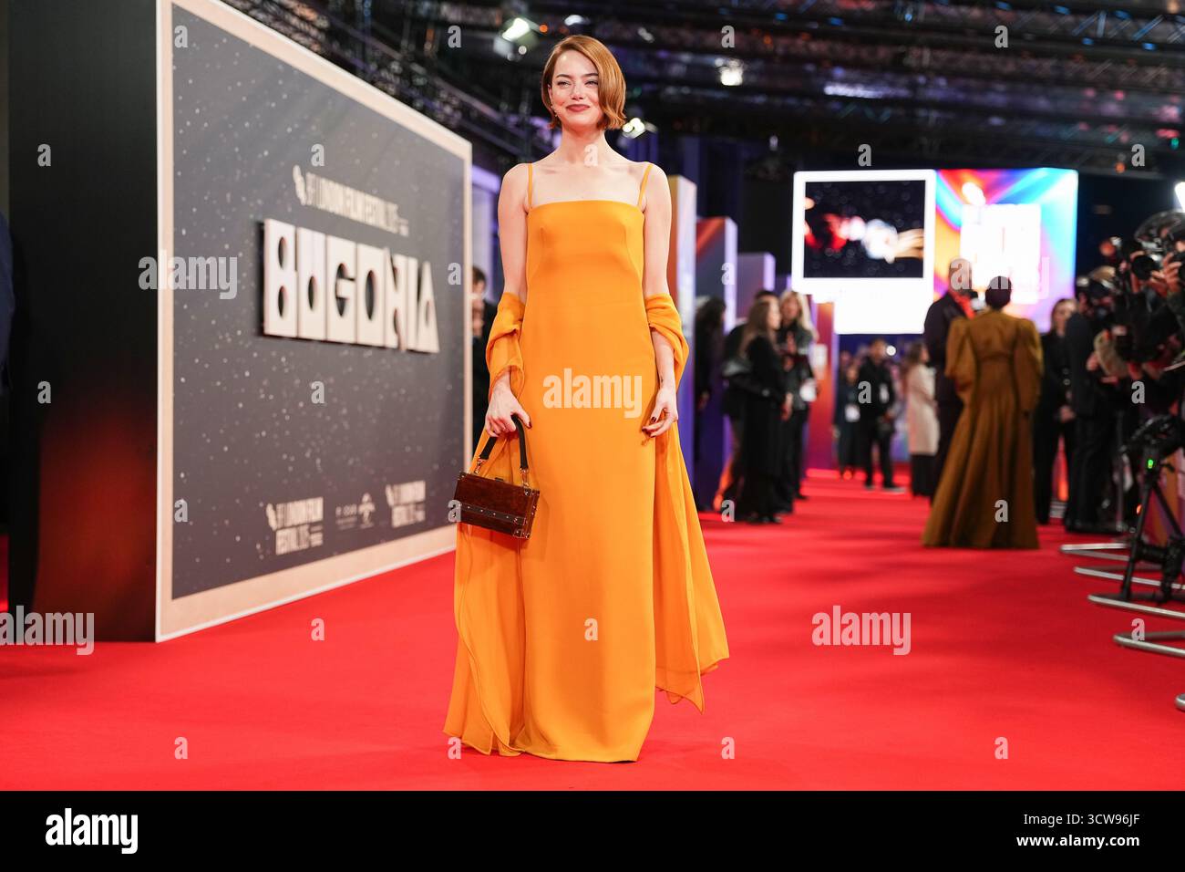 Emma Stone poses for photographers upon arrival at the premiere of the ...