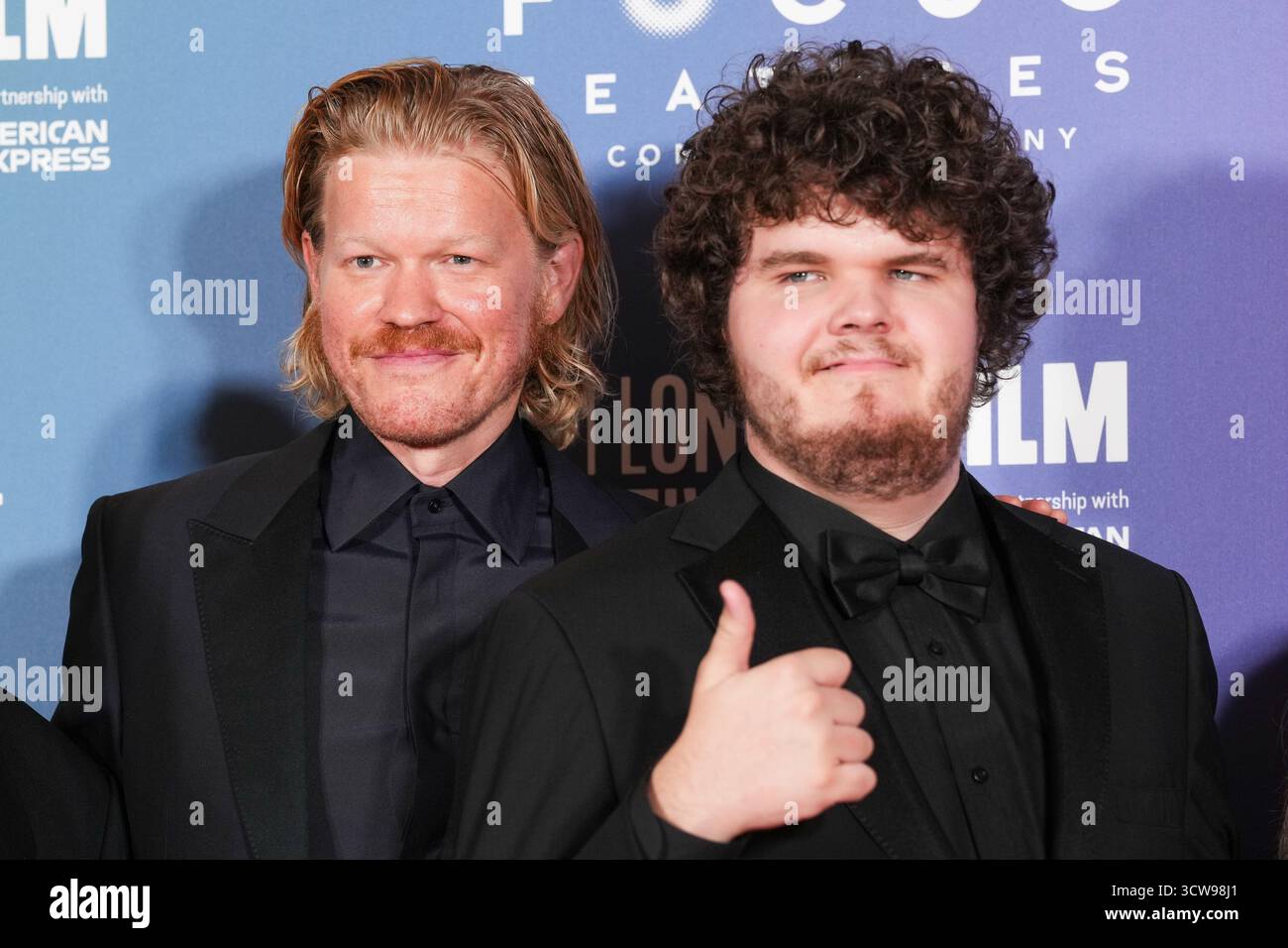 Jesse Plemons, left, and Aidan Delbis pose for photographers upon ...