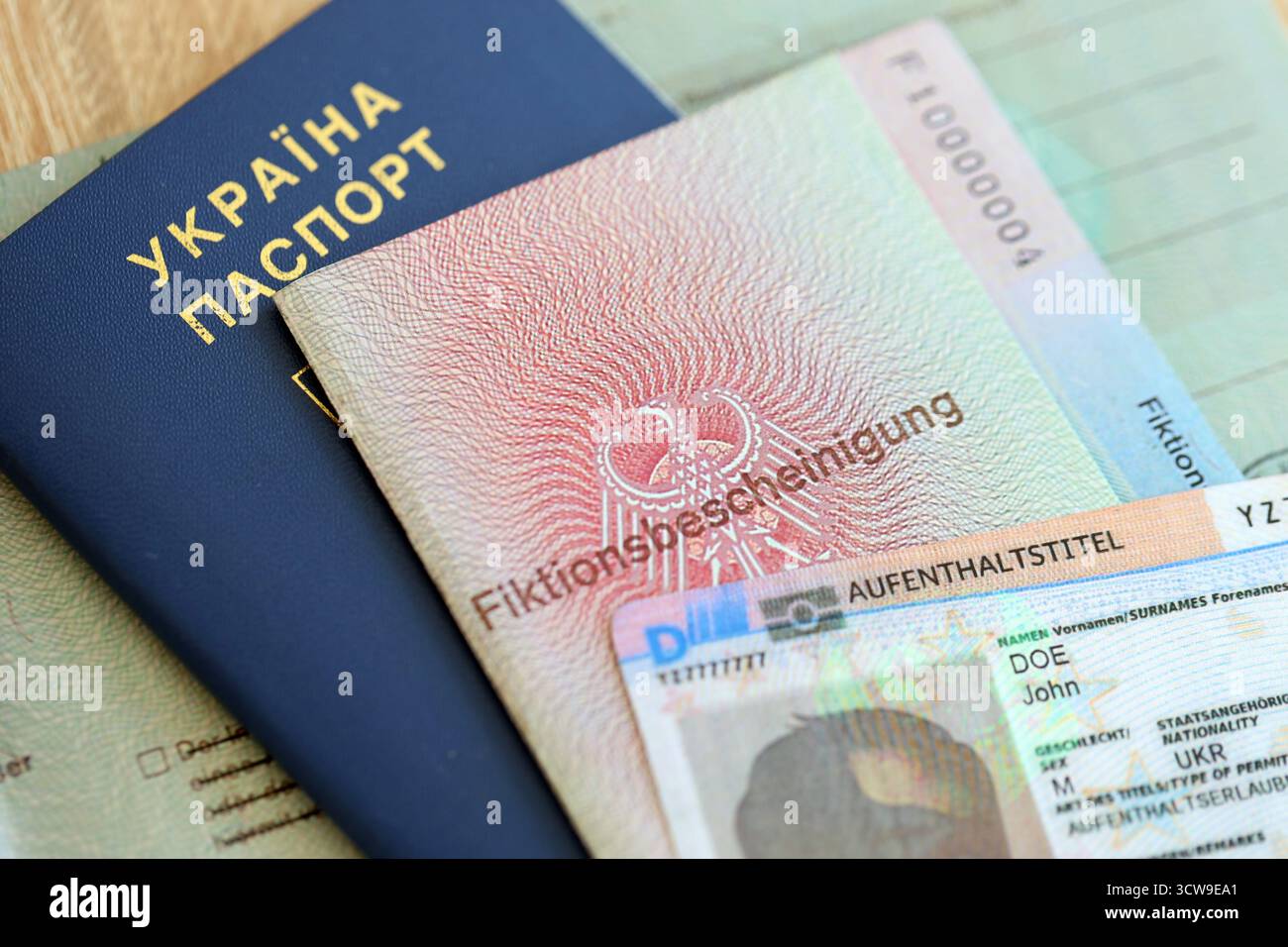 German Permanent resident card and document specimen lies with ...