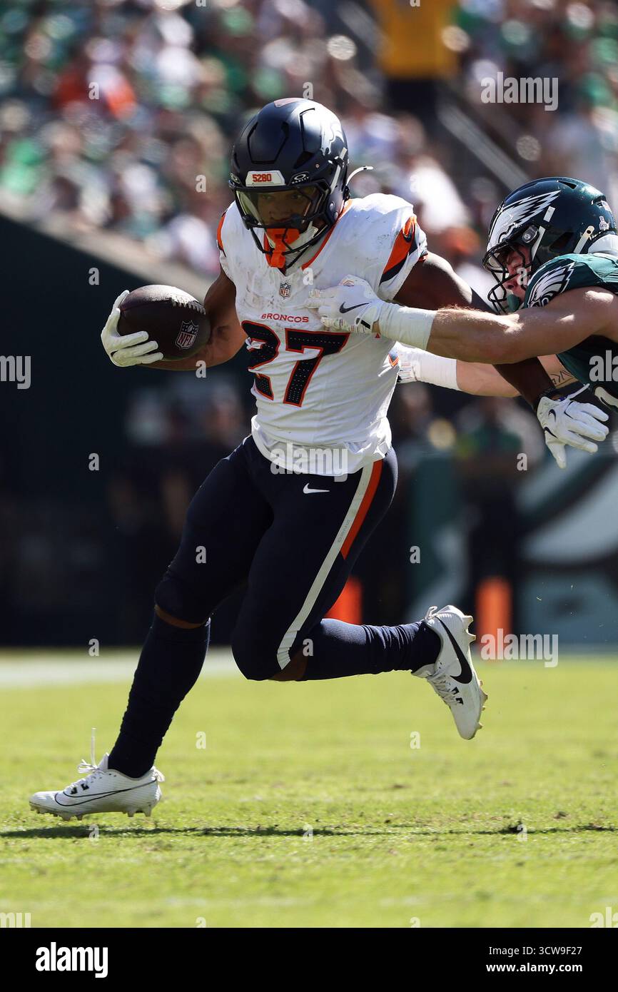Denver Broncos running back J.K. Dobbins (27) runs with the ball during ...