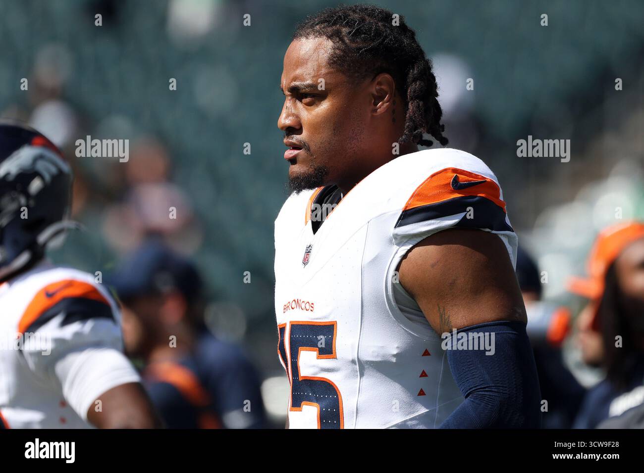 Denver Broncos linebacker Nik Bonitto (15) looks on before an NFL ...