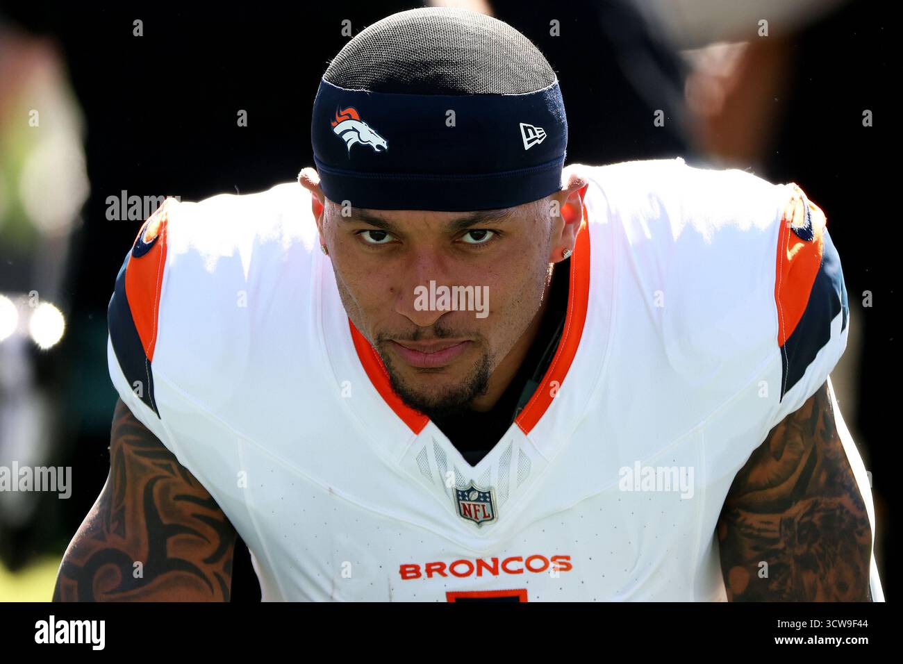 Denver Broncos tight end Evan Engram (1) looks on before an NFL ...