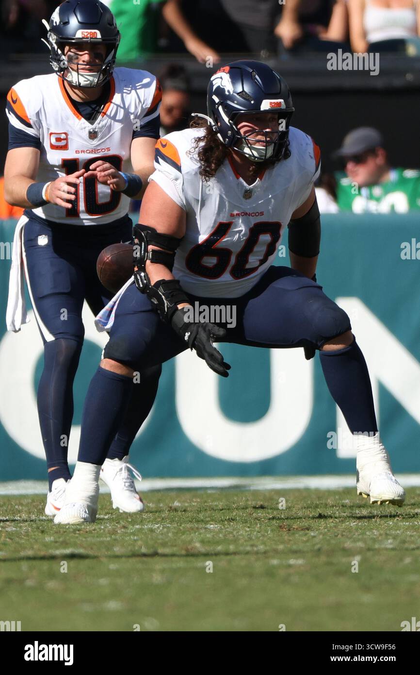 Denver Broncos center Luke Wattenberg (60) blocks during an NFL ...