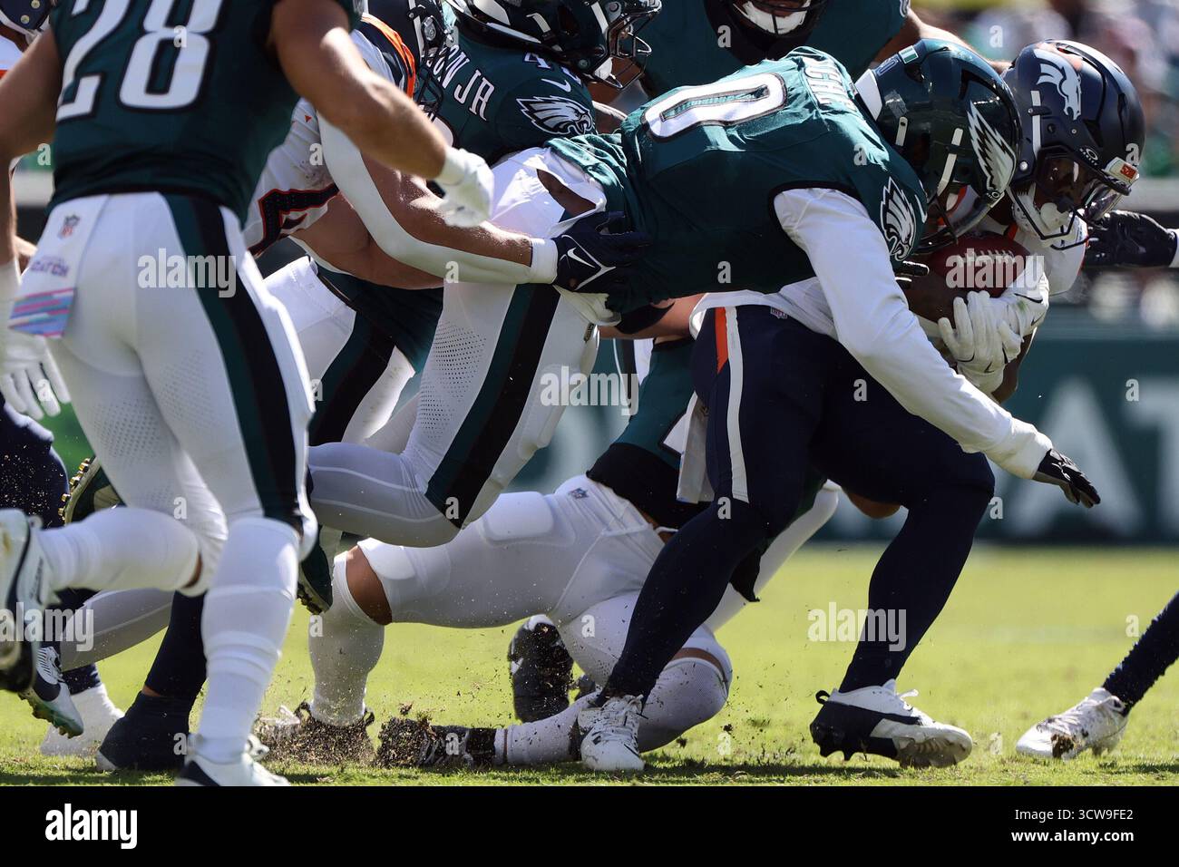 Philadelphia Eagles linebacker Joshua Uche (0) takes down Denver ...