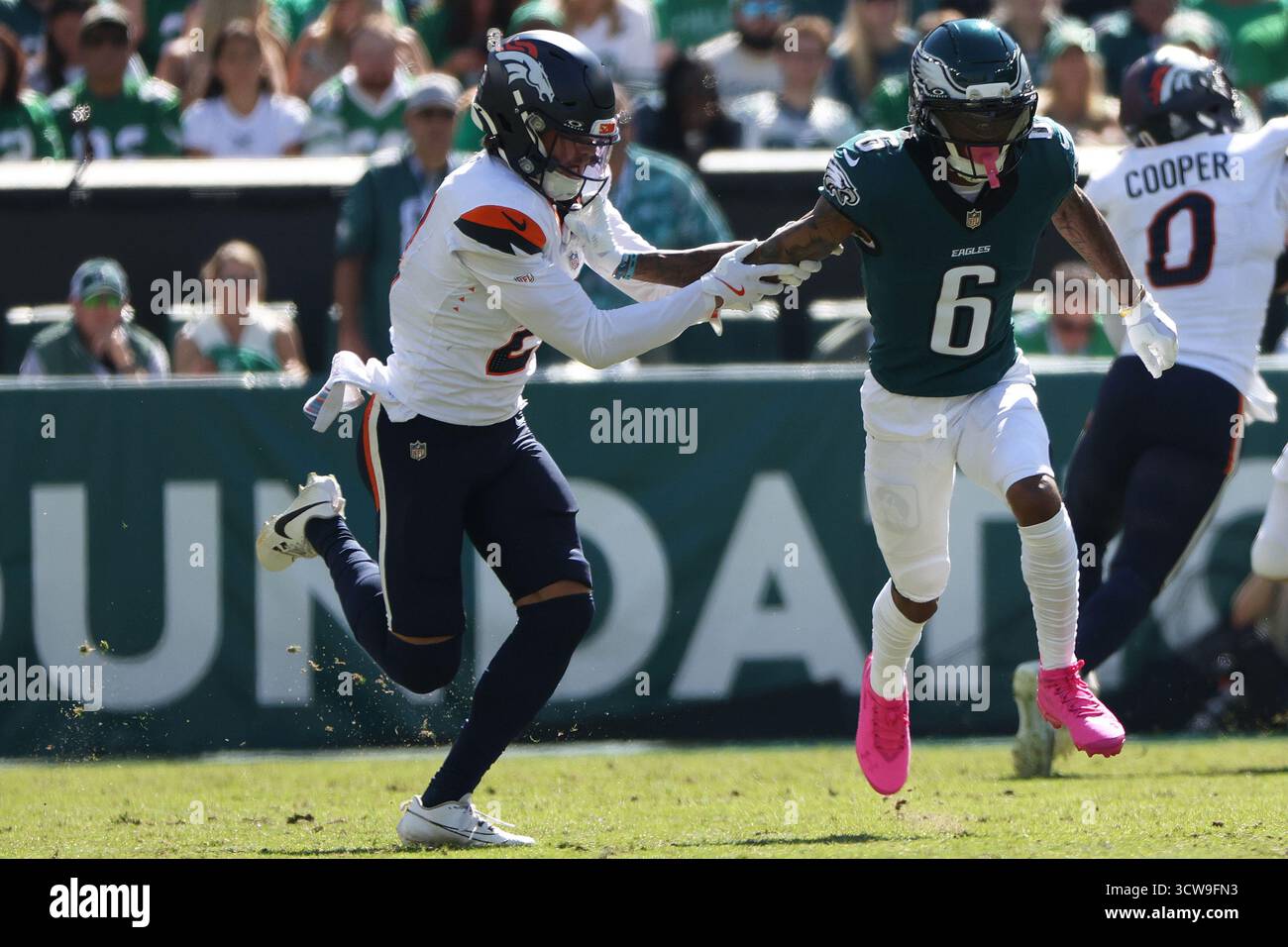 Denver Broncos cornerback Riley Moss (21) holds Philadelphia Eagles ...