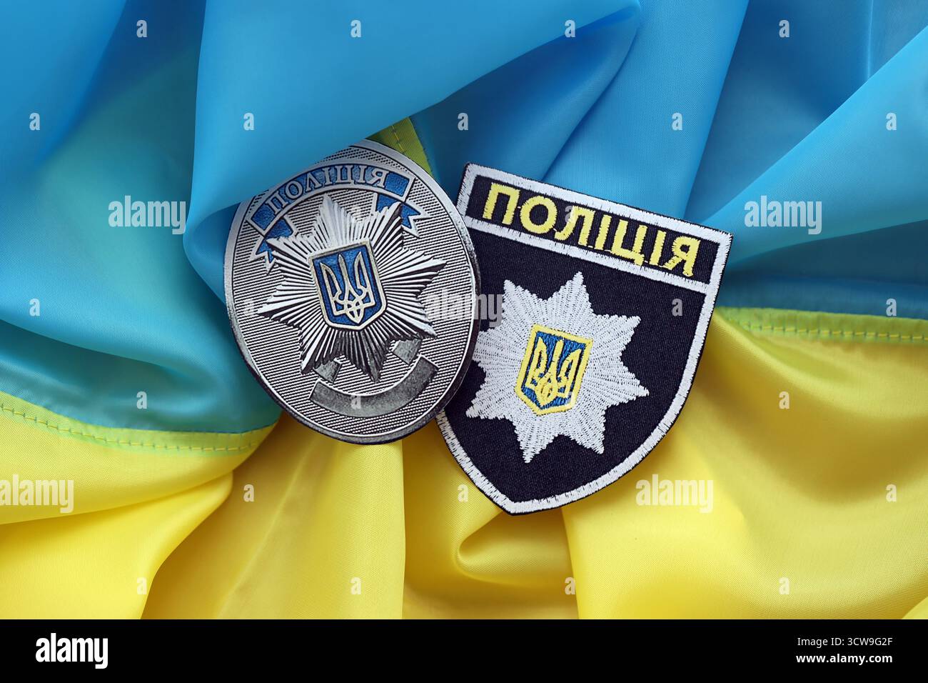 KYIV, UKRAINE - SEPTEMBER 17, 2025 Ukrainian Police badges on waving ...
