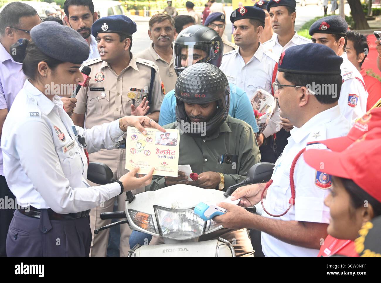 NEW DELHI, INDIA - OCTOBER 10: Delhi Traffic Police conducts Helmet ...