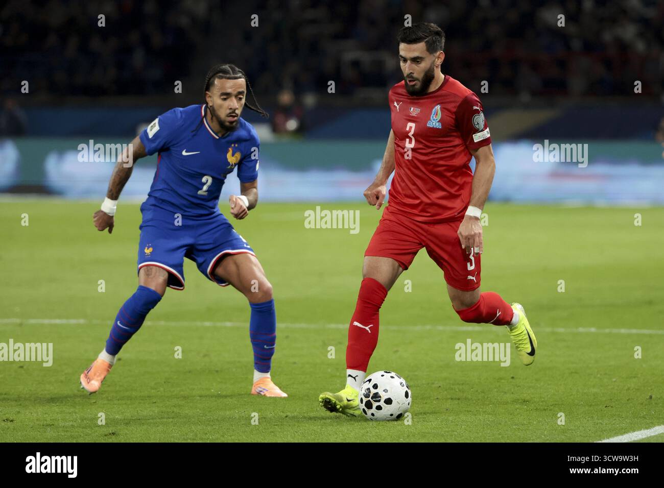 Elvin Jafarguliyev of Azerbaijan, left Malo Gusto of France during the FIFA World Cup 2026 ...