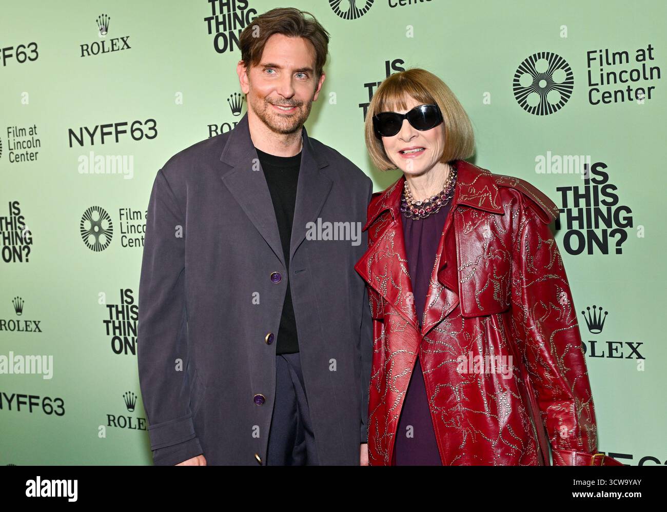 Bradley Cooper, left, and Anna Wintour attend the premiere of "Is This ...
