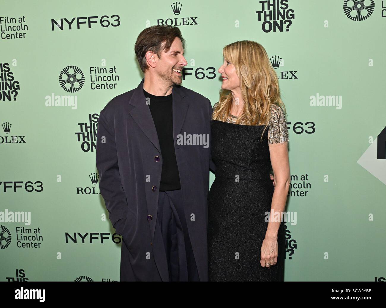Bradley Cooper, left, and Laura Dern attend the premiere of "Is This ...