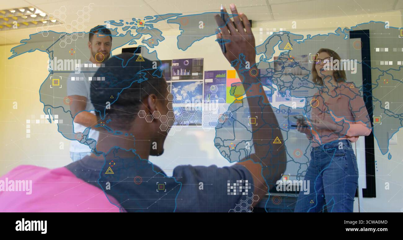 Group of three professionals collaborating in office meeting room, with ...