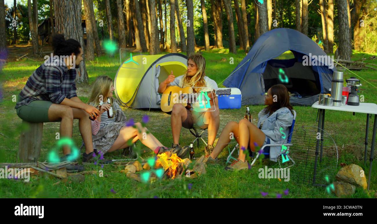 Four friends around camping tents hi-res stock photography and images ...