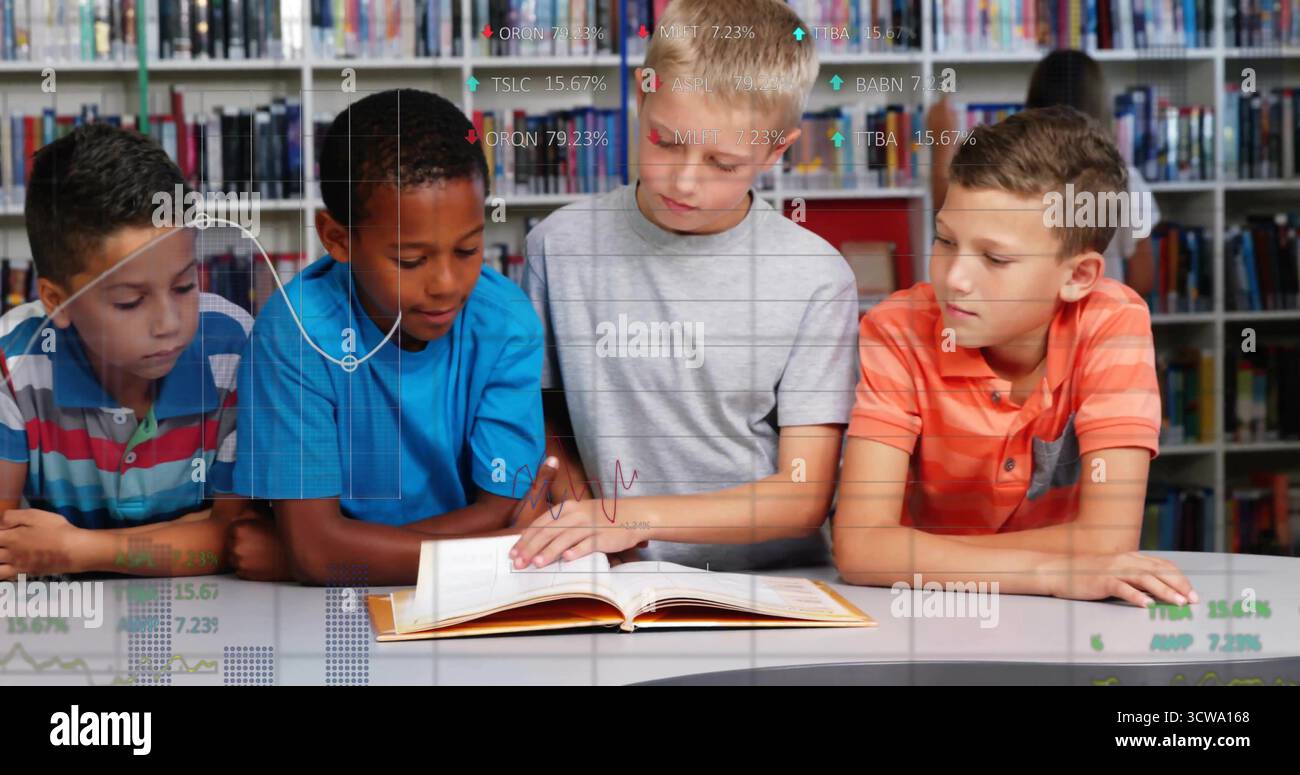 Studying four boys reading open book on white table in library, with ...
