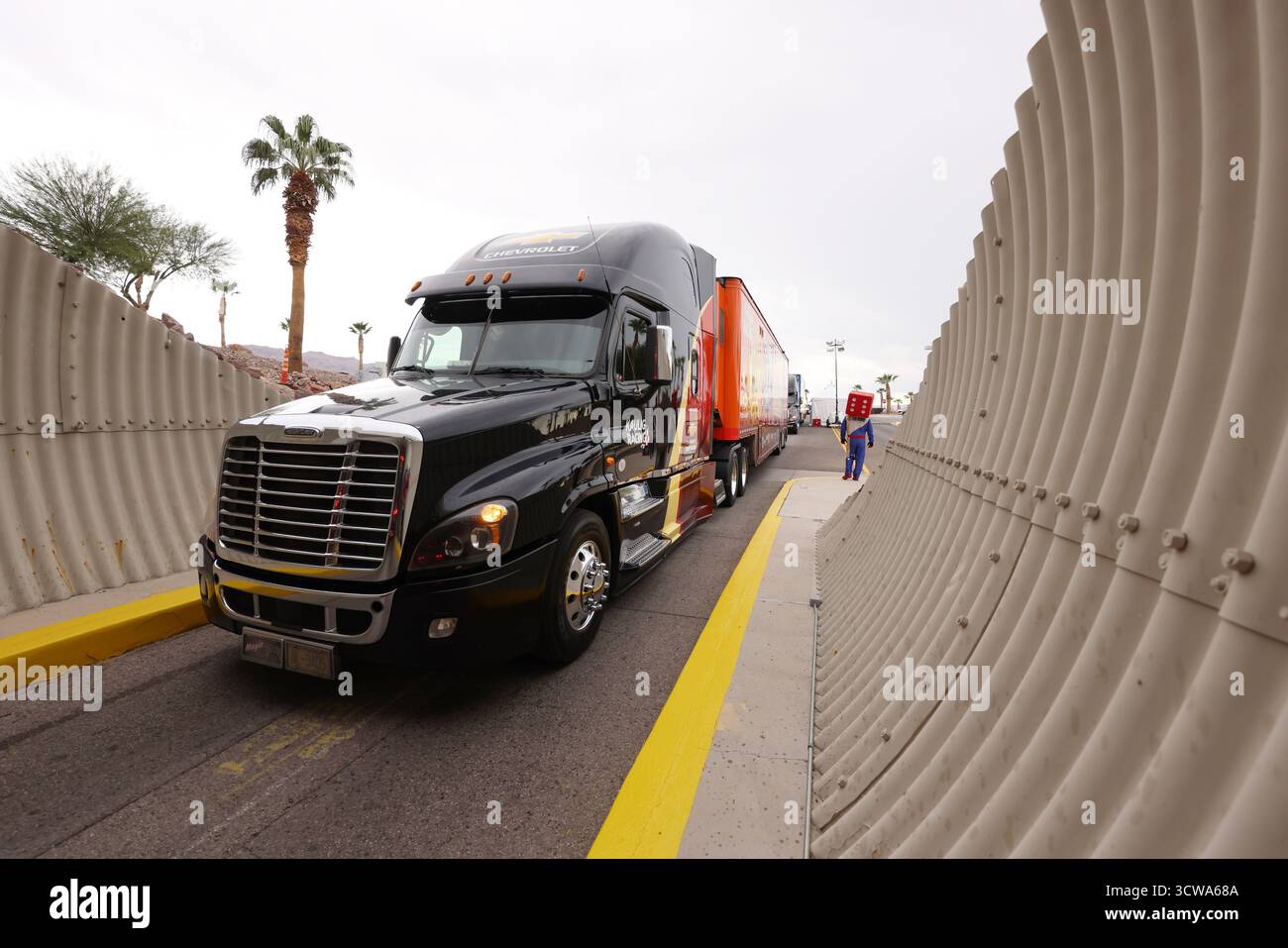 LAS VEGAS, NV - OCTOBER 10: NASCAR Cup Series haulers enter the infield ...