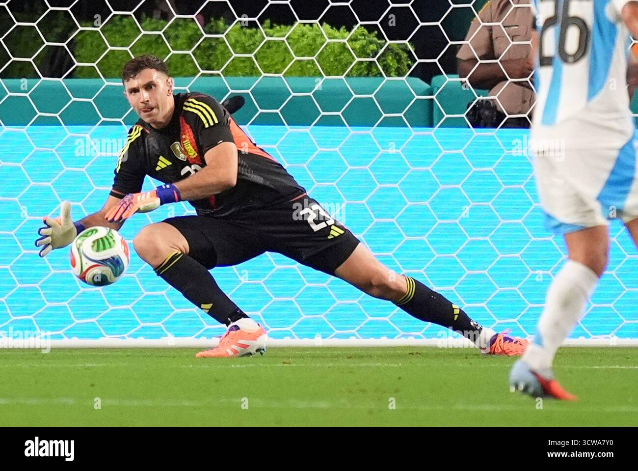 Argentina goalkeeper Emiliano Martinez (23) stops a shot from Venezuela ...