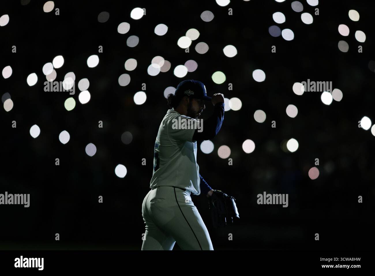 Seattle Mariners pitcher Andrés Muñoz walks on to the field during the ...