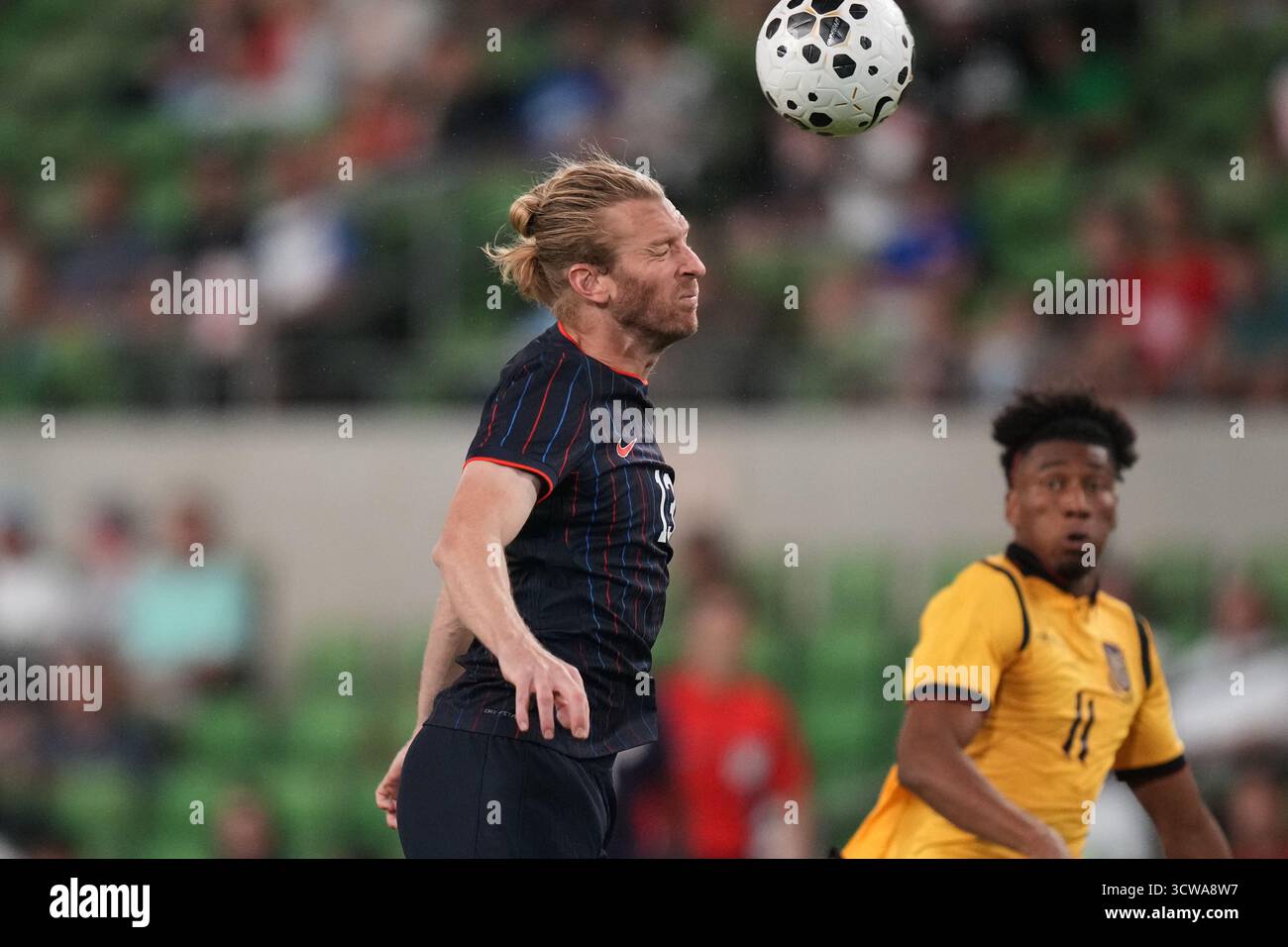 United States defender Tim Ream (13) heads the ball against Ecuador ...