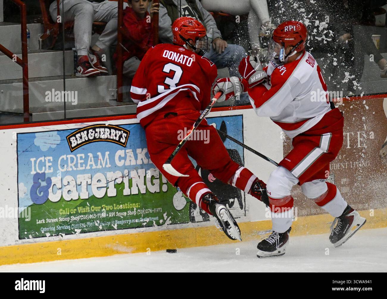 Miami University Ohio defenseman Nick Donato (3) and Rensselaer ...