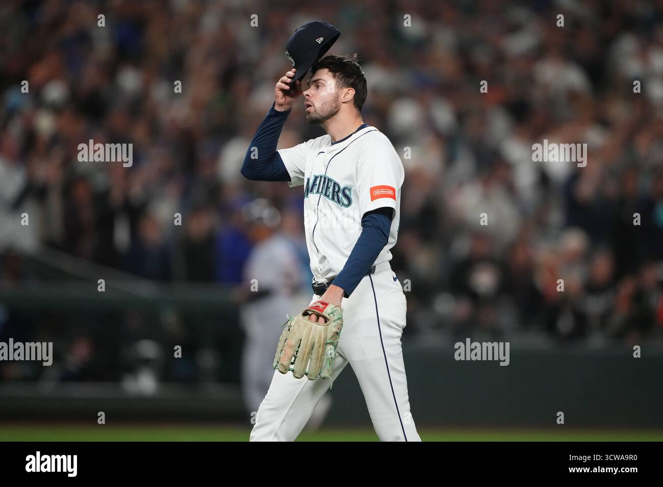 Seattle Mariners pitcher Matt Brash reacts after the top of the seventh ...