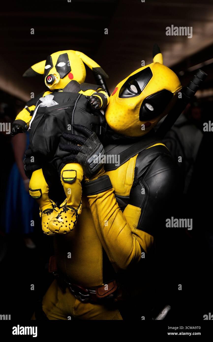 An attendee dressed as Deadpool Pikachu poses during New York Comic Con ...