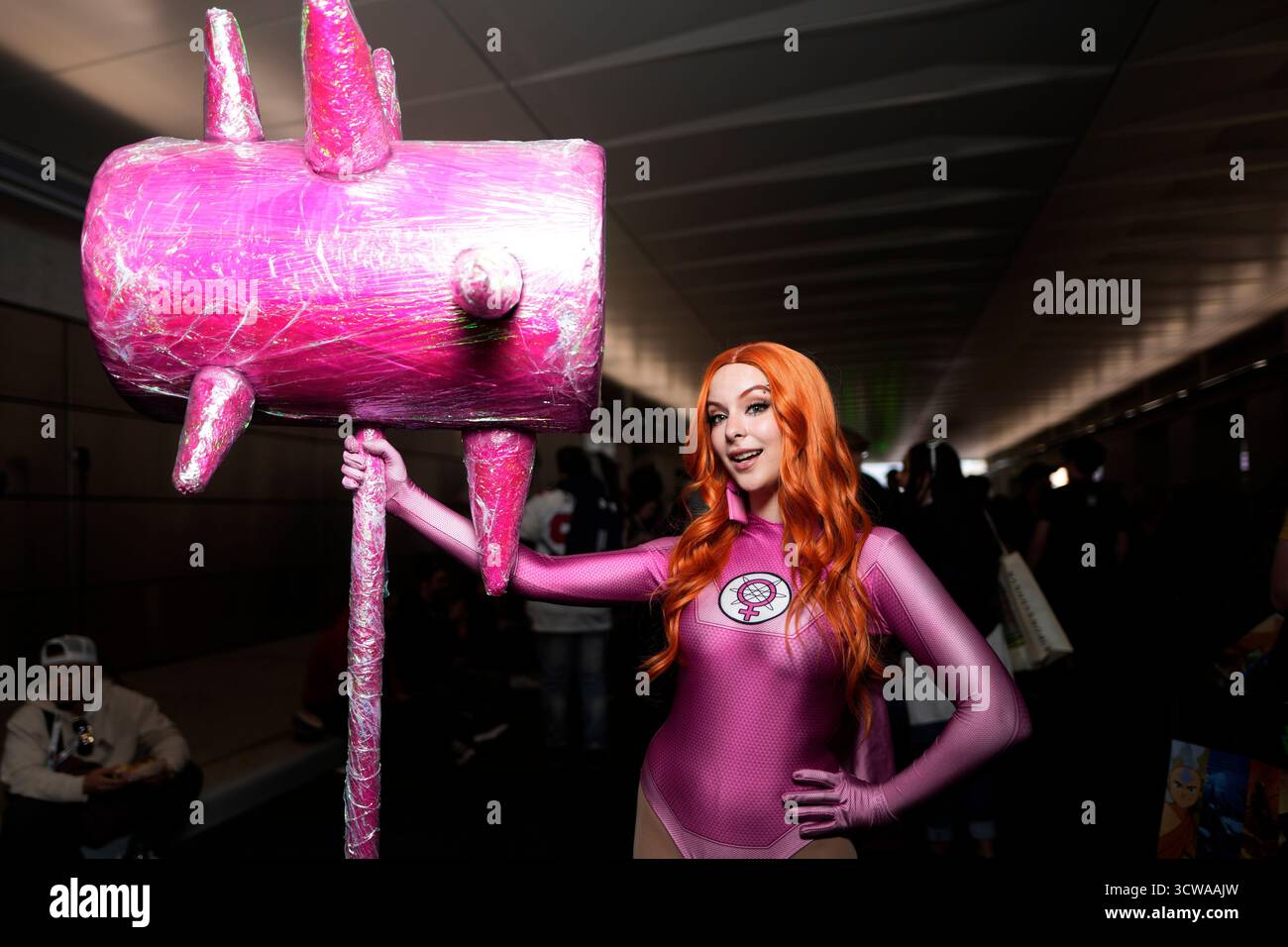 An attendee dressed as Atom Eve poses during New York Comic Con at the ...