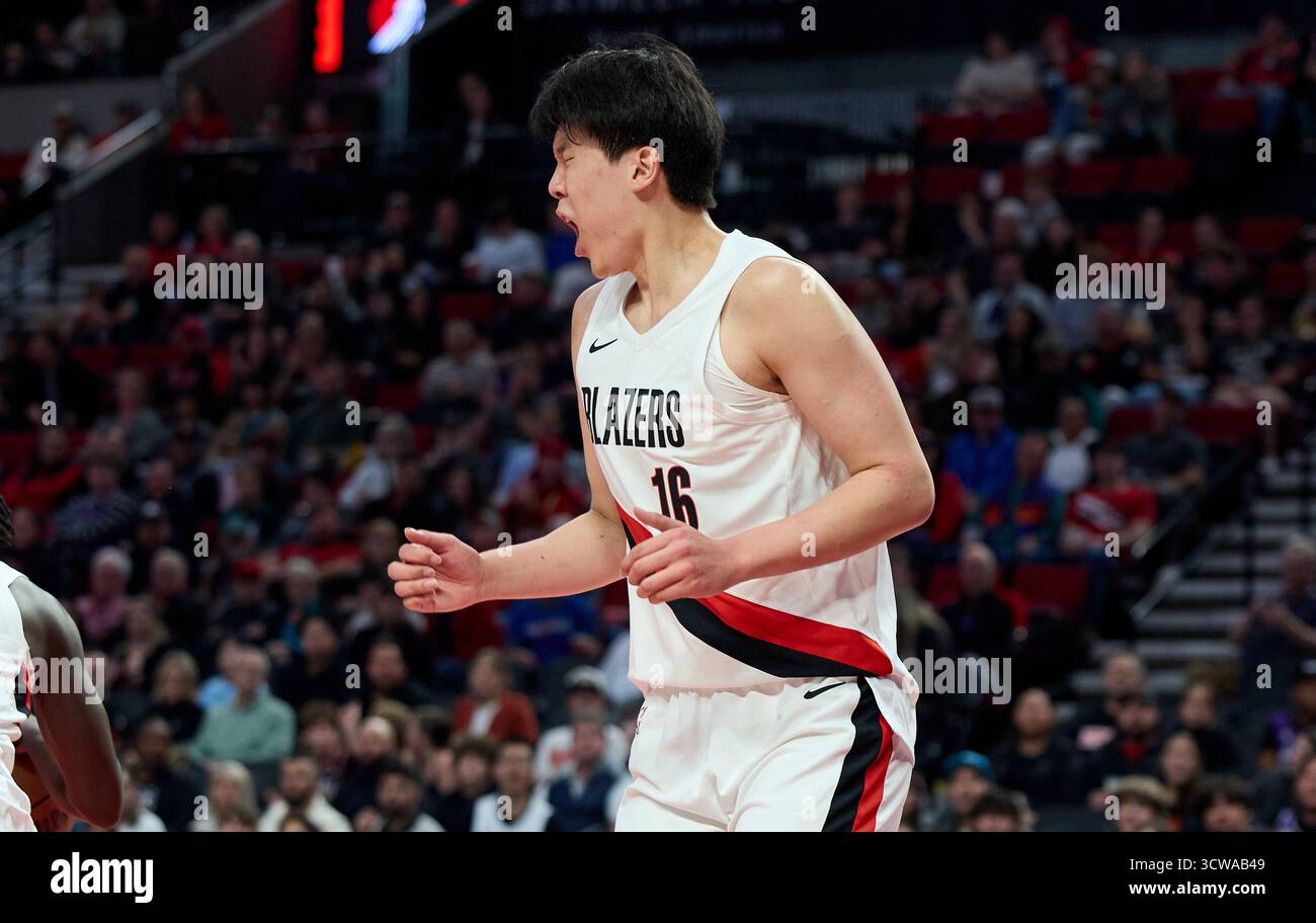 Portland Trail Blazers center Yang Hansen reacts after being called for ...