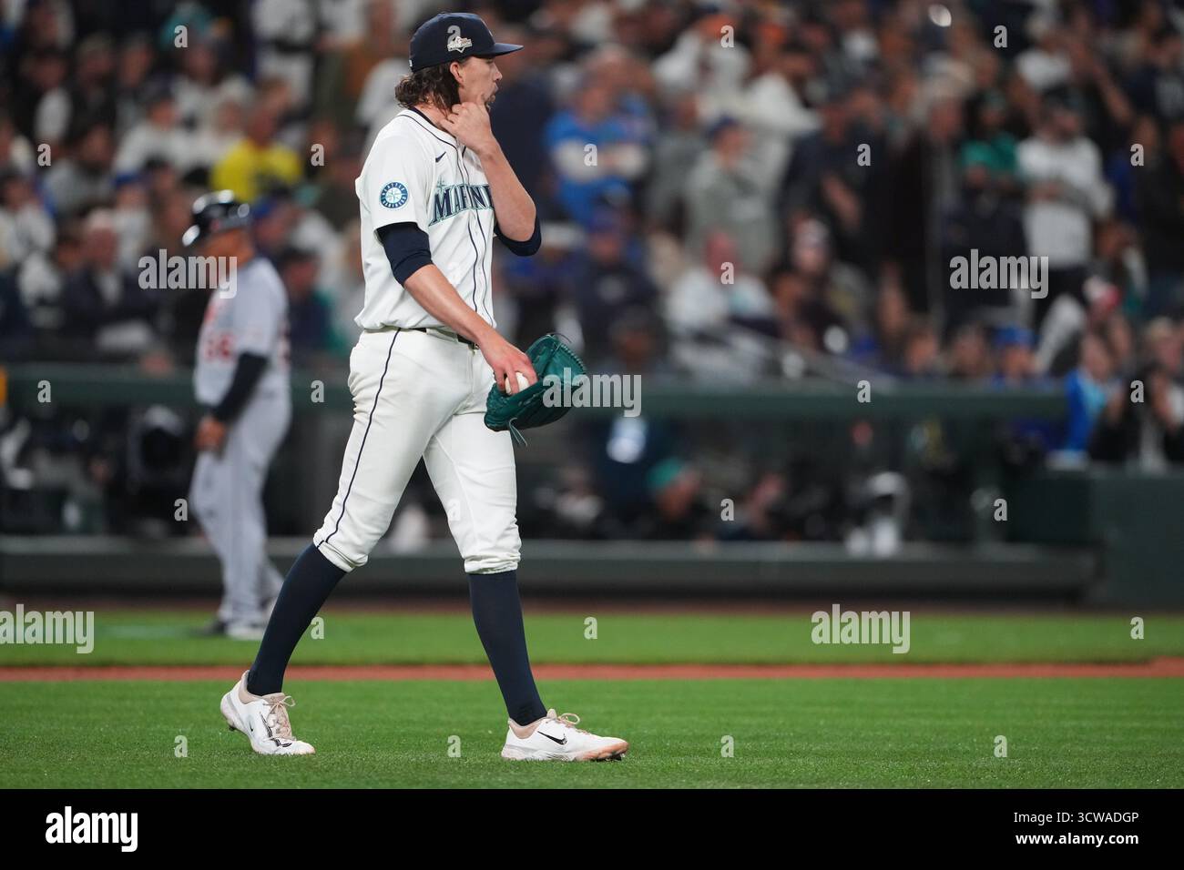 Seattle Mariners pitcher Logan Gilbert reacts after a single by Detroit ...