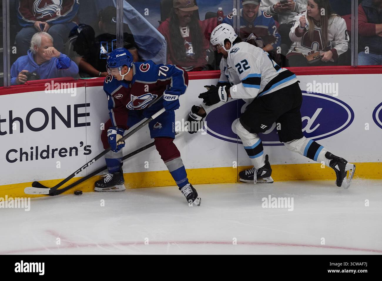 Colorado Avalanche defenseman Sam Malinski (70) and Utah Mammoth center ...