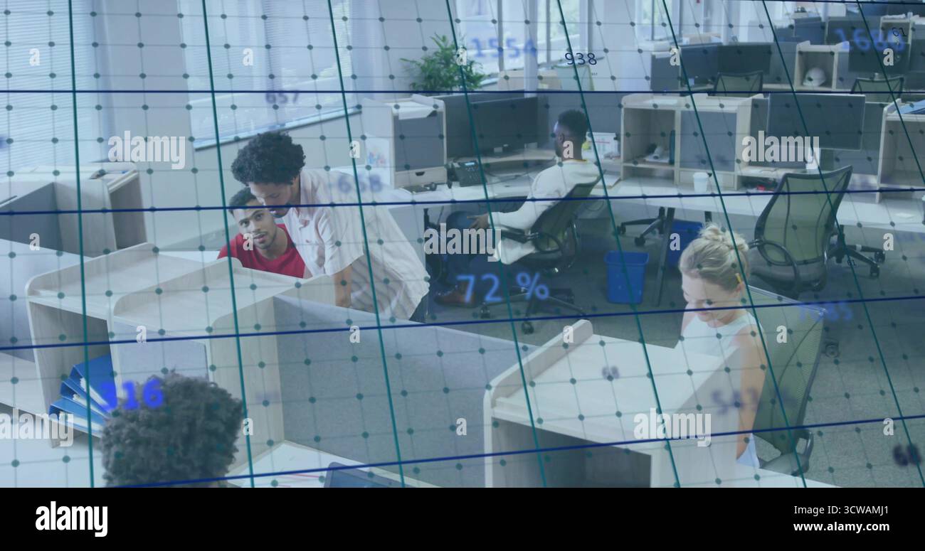 Man leaning over coworker typing hi-res stock photography and images ...
