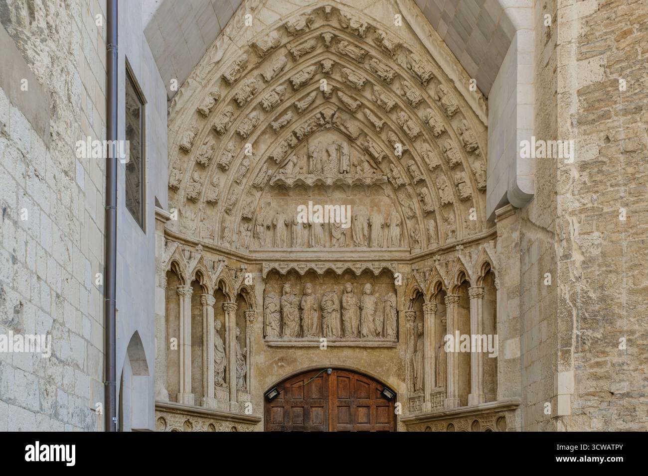 A high-resolution close-up of the Gothic stone portal, showing the ...