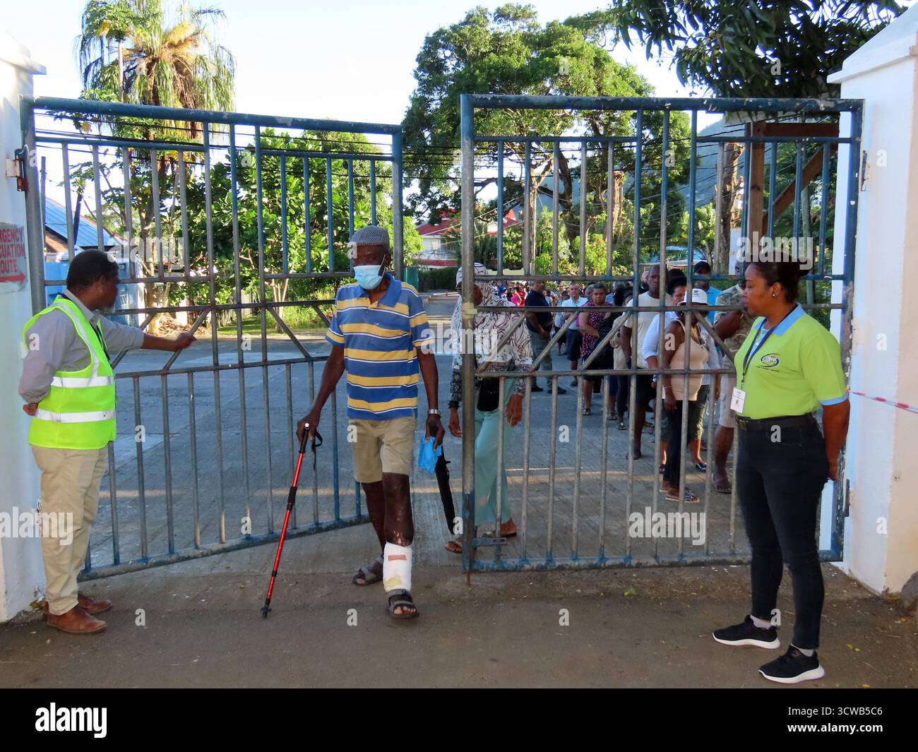 People line up to cast their votes in a runoff presidential election at ...