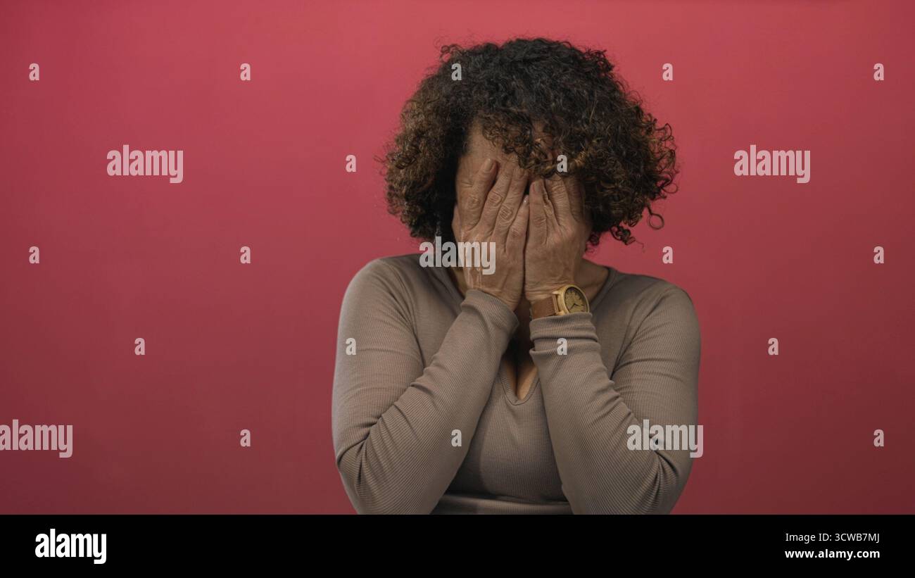 Hispanic middleaged woman holds hi-res stock photography and images - Alamy