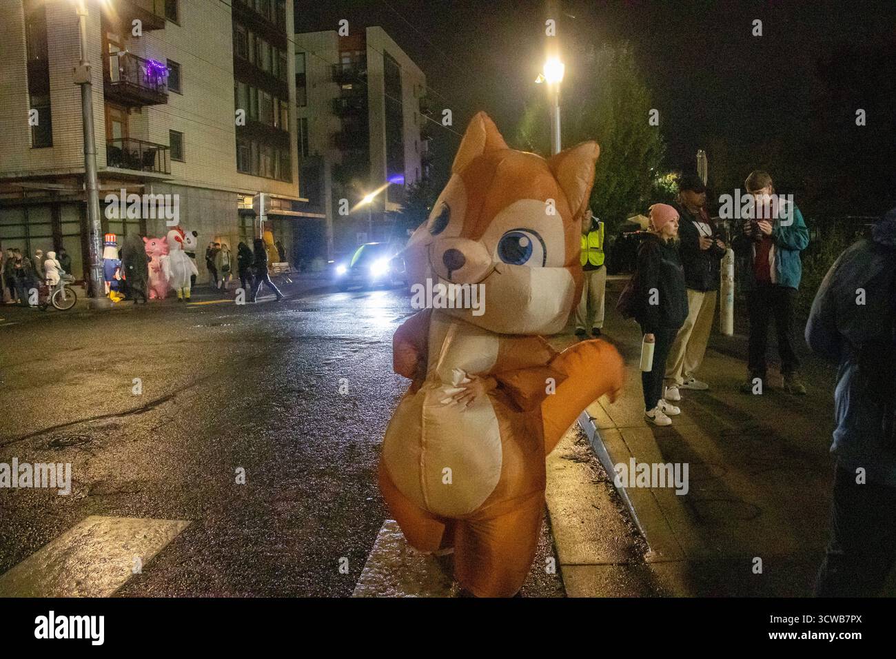 PORTLAND, OR: The City of Portland protests, some in inflatable ...