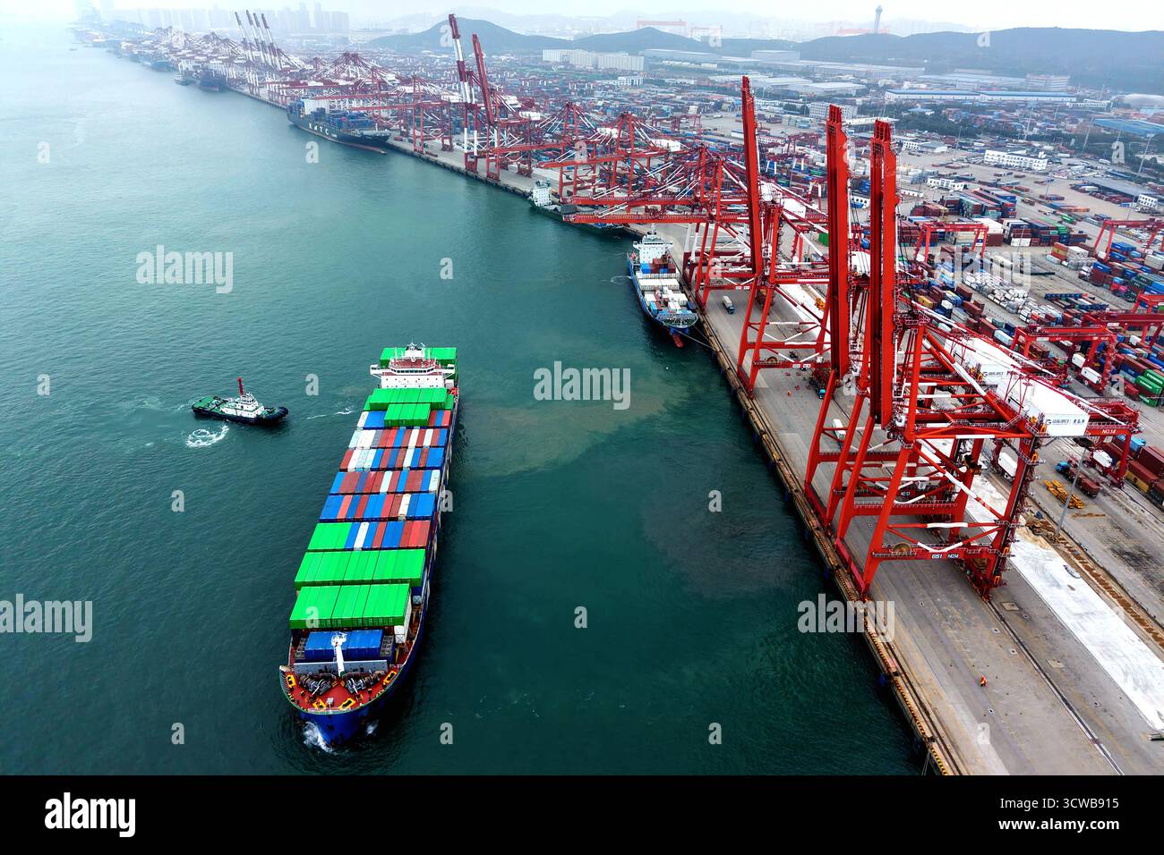 QINGDAO, CHINA - OCTOBER 11, 2025 - A cargo ship loaded with foreign ...