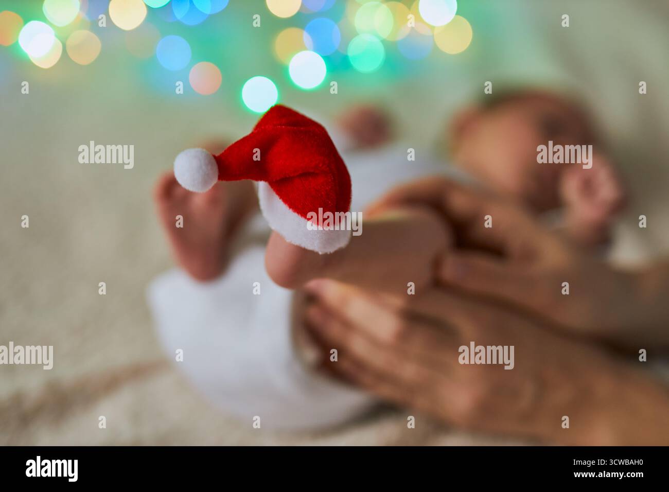 Baby feet in funny christmas hi-res stock photography and images - Alamy