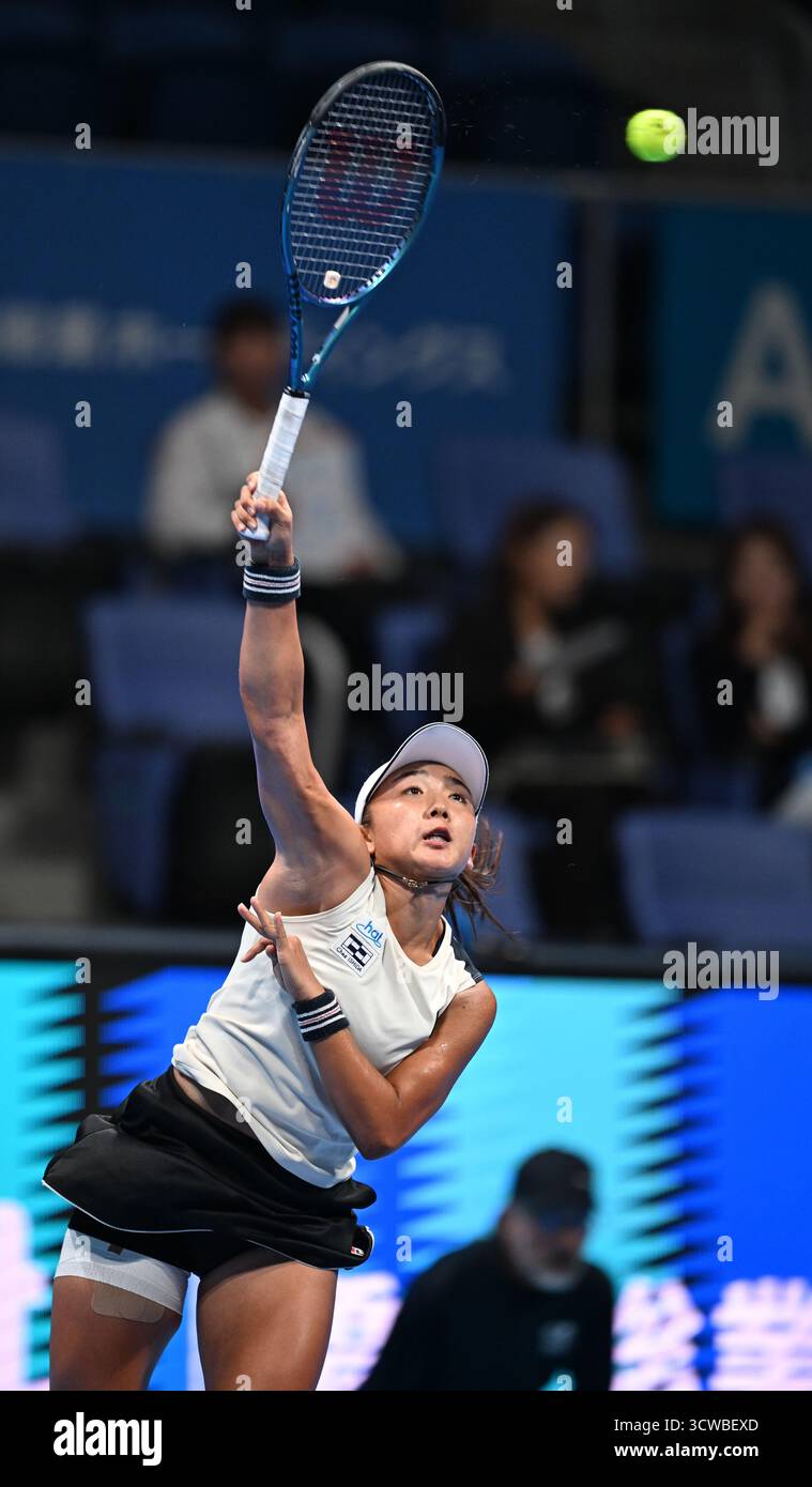 Kyoka Okamura serves a shot against Ayano Shimizu in the women's ...