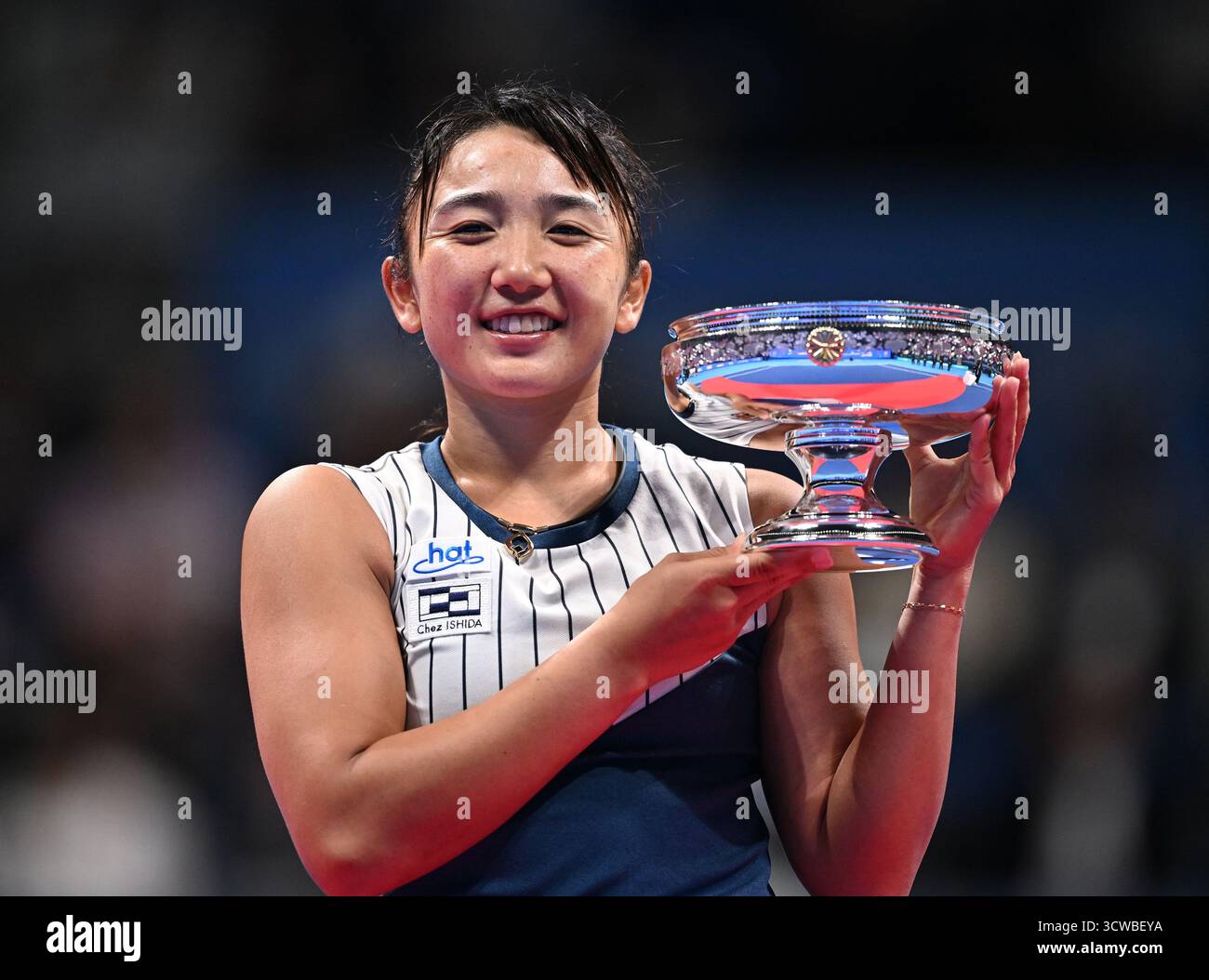 Kyoka Okamura celebrates at an award ceremony after defeating Ayano ...