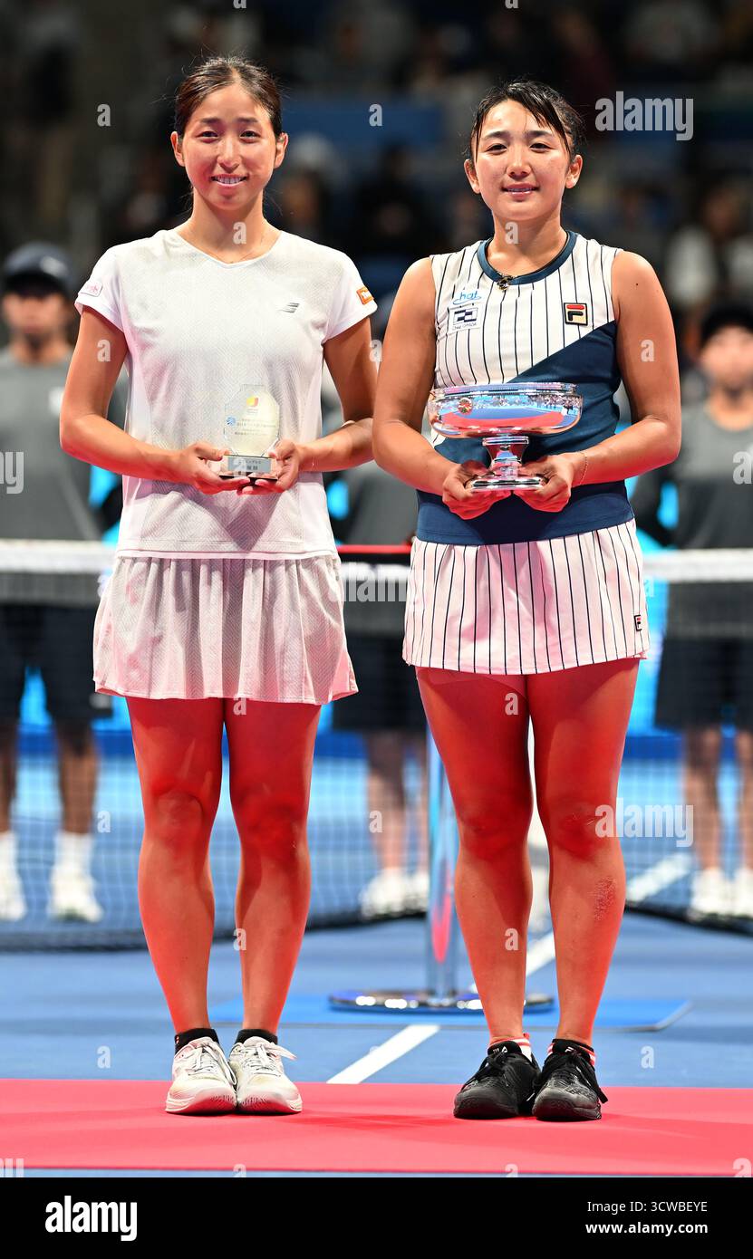 Kyoka Okamura (R) and Ayano Shimizu pose for photos at an award ...