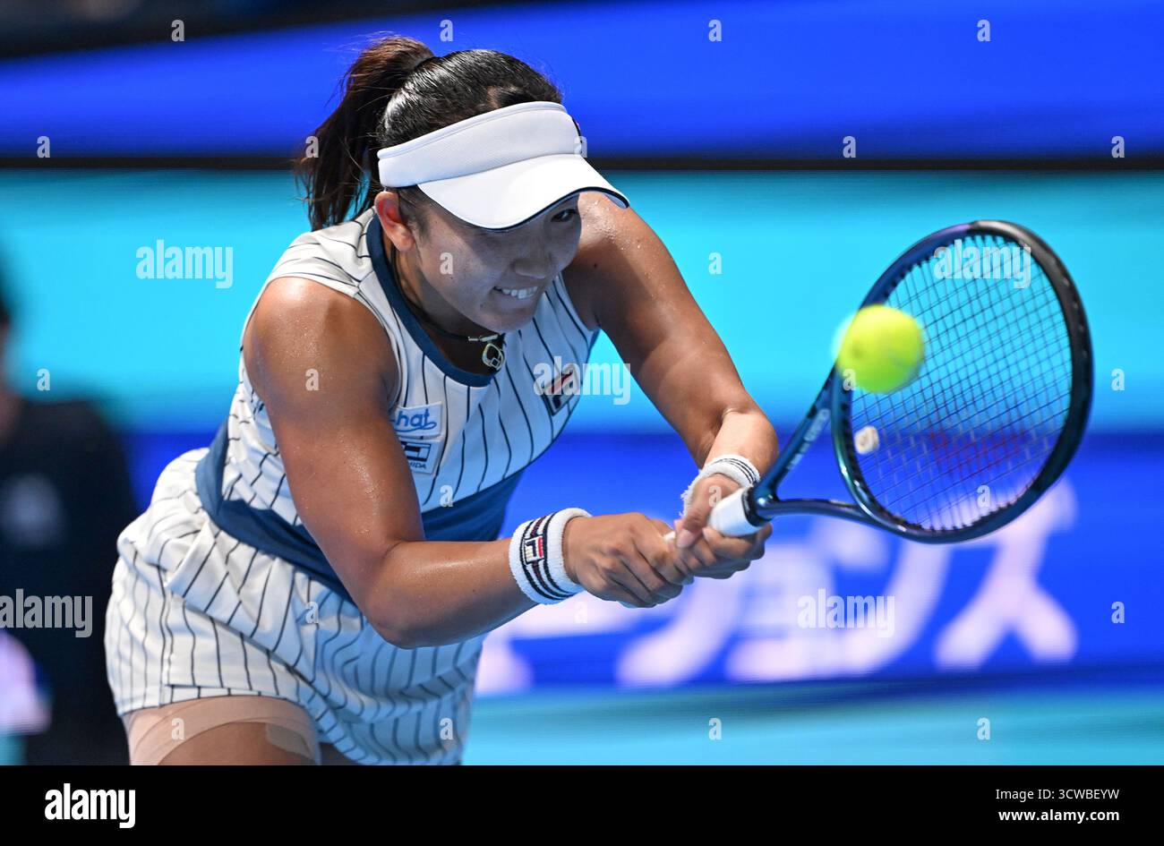 Kyoka Okamura returns a shot against Ayano Shimizu in the women's ...