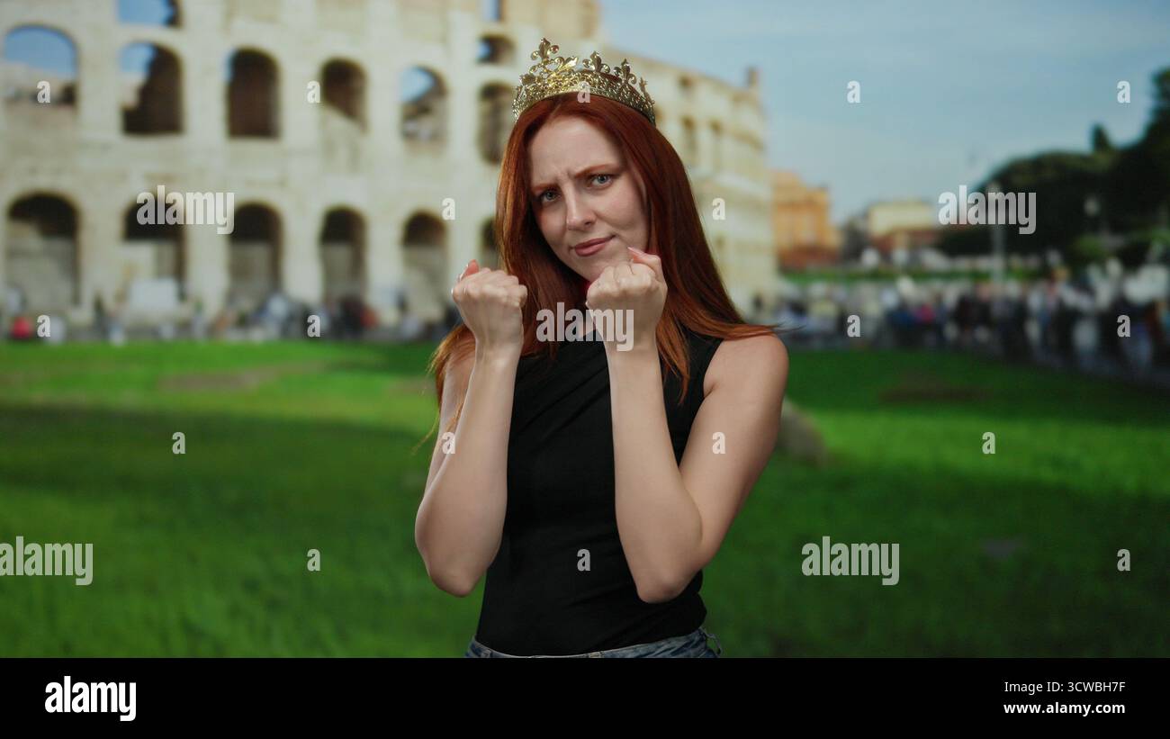Woman crown outside roman coliseum hi-res stock photography and images ...