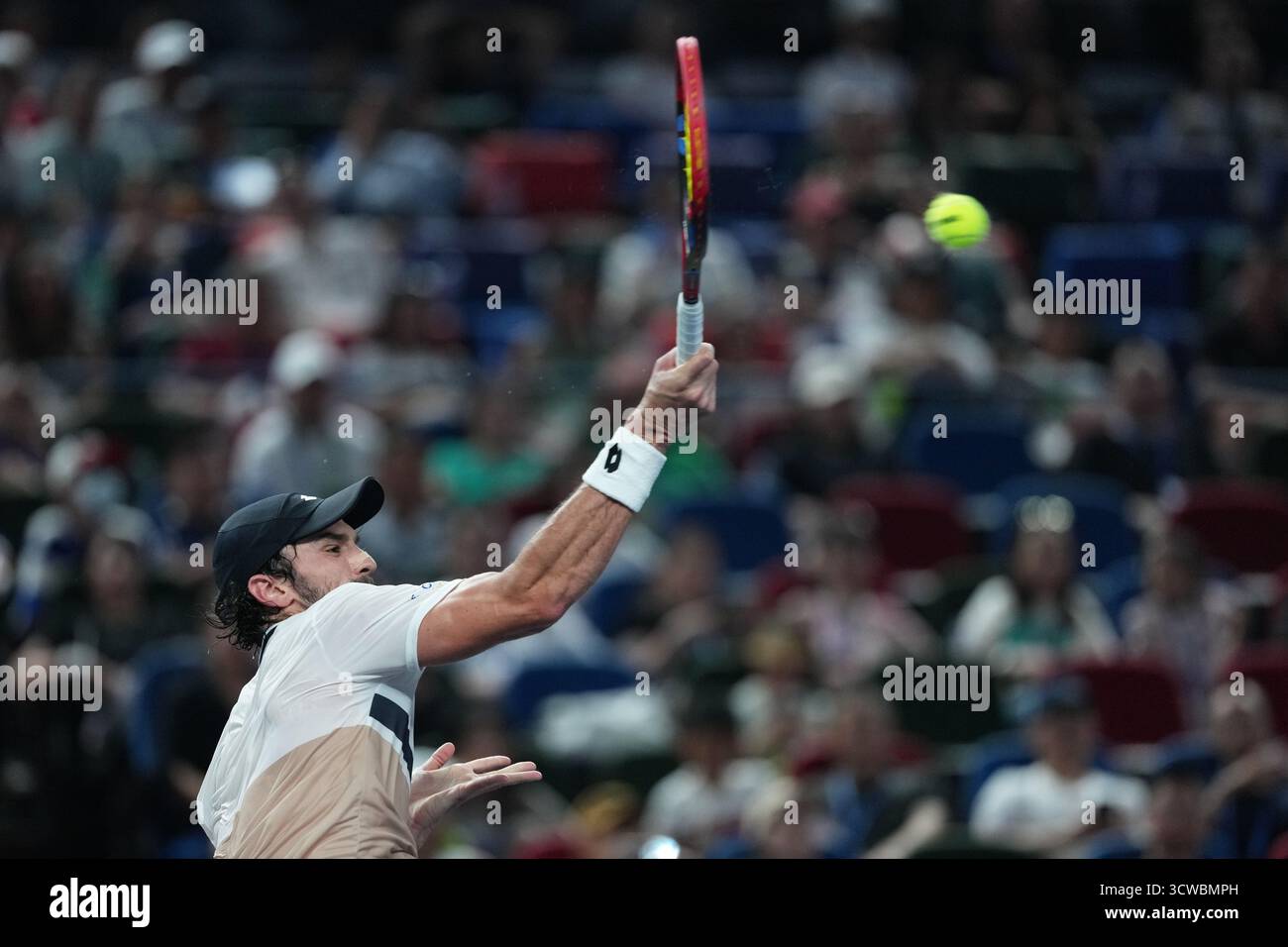 Valentin Vacherot of Monaco plays a forehand return to Novak Djokovic ...