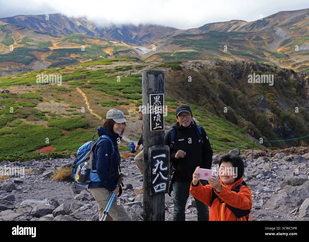 Climbers climb Mount Kurodake in Kamikawa Town, Hokkaido Prefecture ...