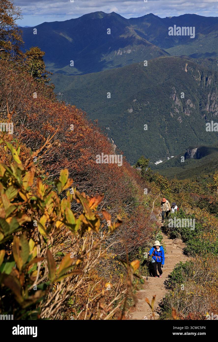 Climbers climb Mount Kurodake in Kamikawa Town, Hokkaido Prefecture ...