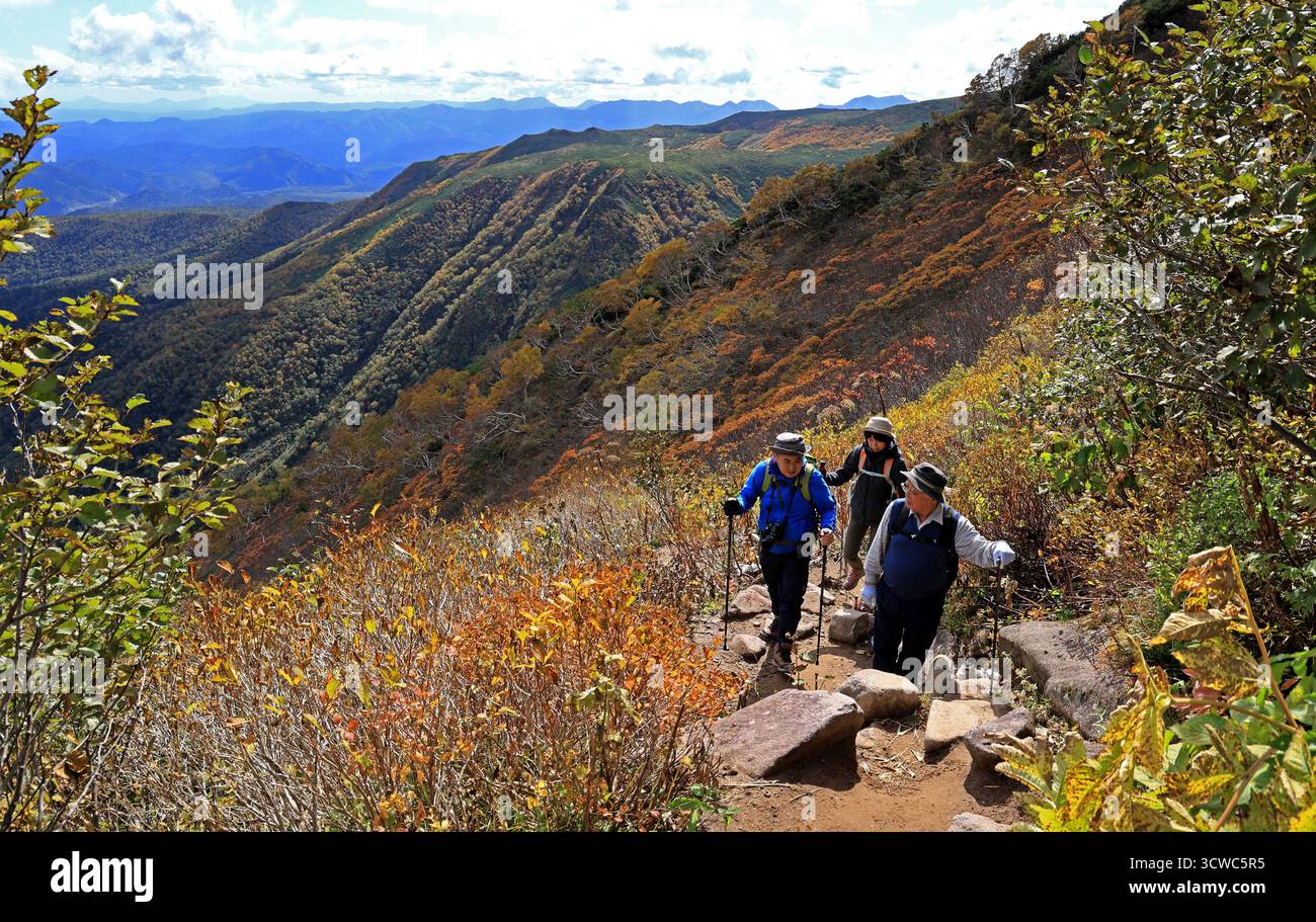 Climbers climb Mount Kurodake in Kamikawa Town, Hokkaido Prefecture ...