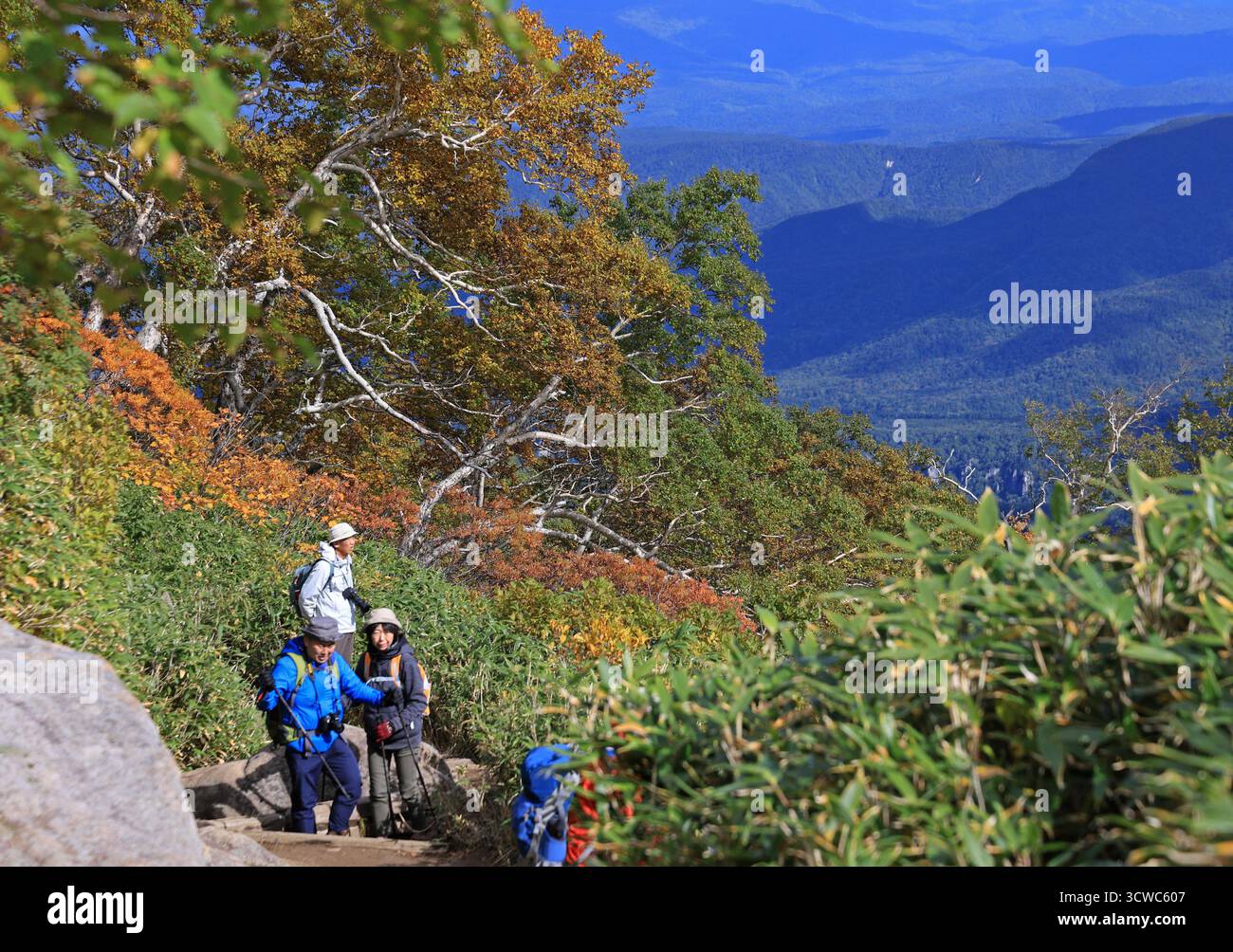 Climbers climb Mount Kurodake in Kamikawa Town, Hokkaido Prefecture ...