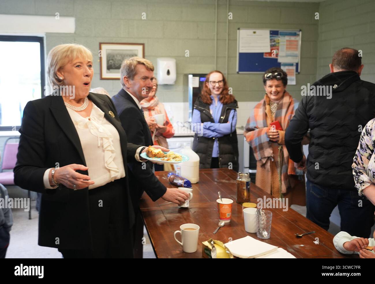 Fine Gael Presidential candidate Heather Humphreys eats a slice of cake ...